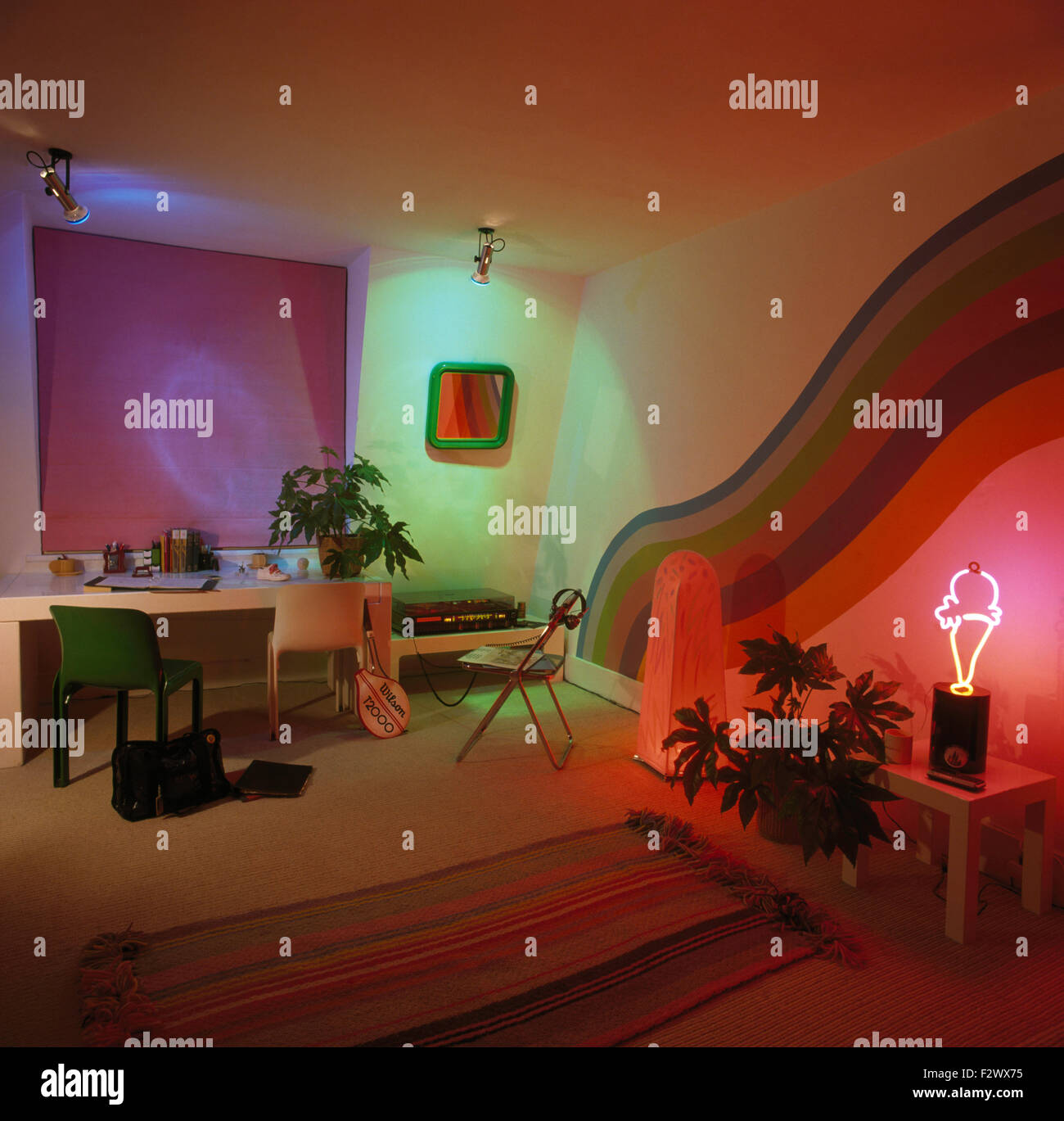 Neon lamp and spotlights in eighties city bedroom with a rainbow ...