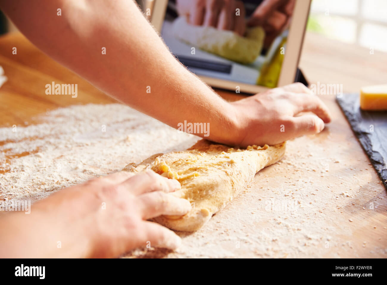 Person Following Pizza Recipe Using App On Digital Tablet Stock Photo ...