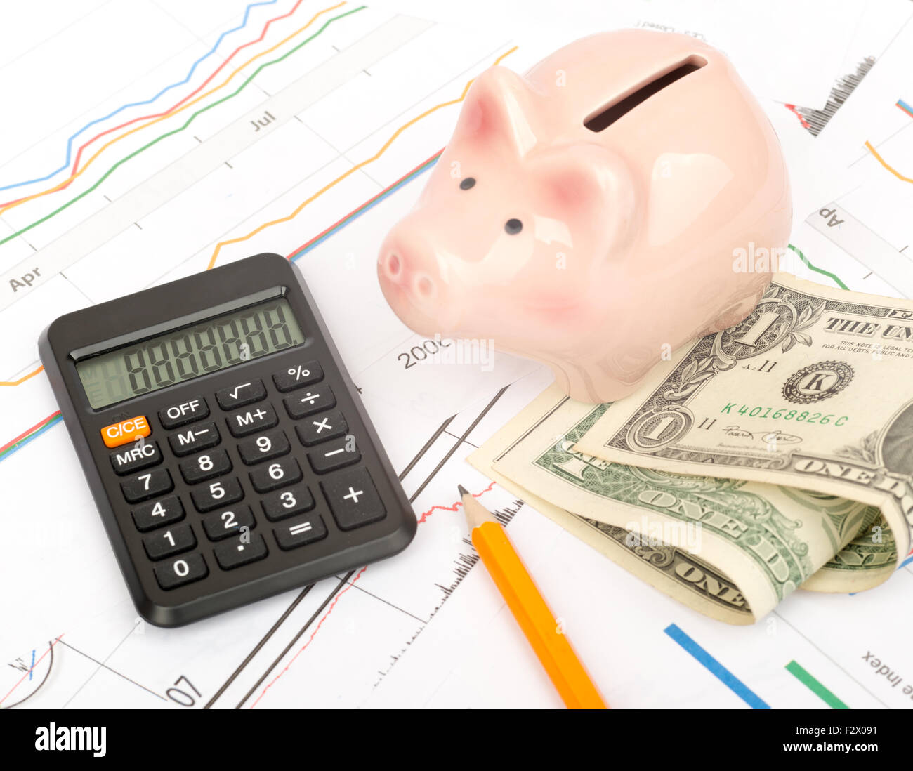 Piggy bank with cash Stock Photo - Alamy