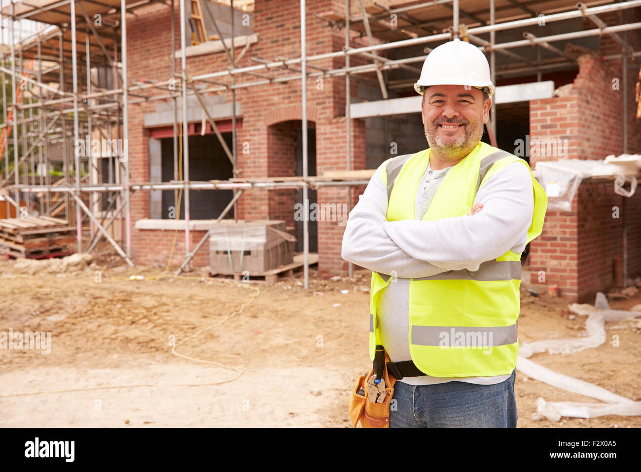 Portrait Of Construction Worker On Building Site Stock Photo - Alamy
