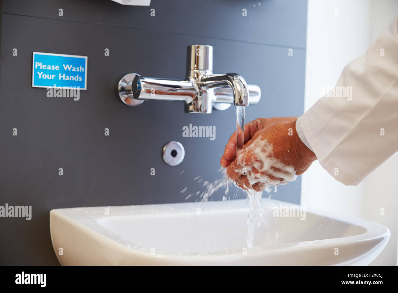 Close Up Of Medical Staff Washing Hands Stock Photo - Alamy