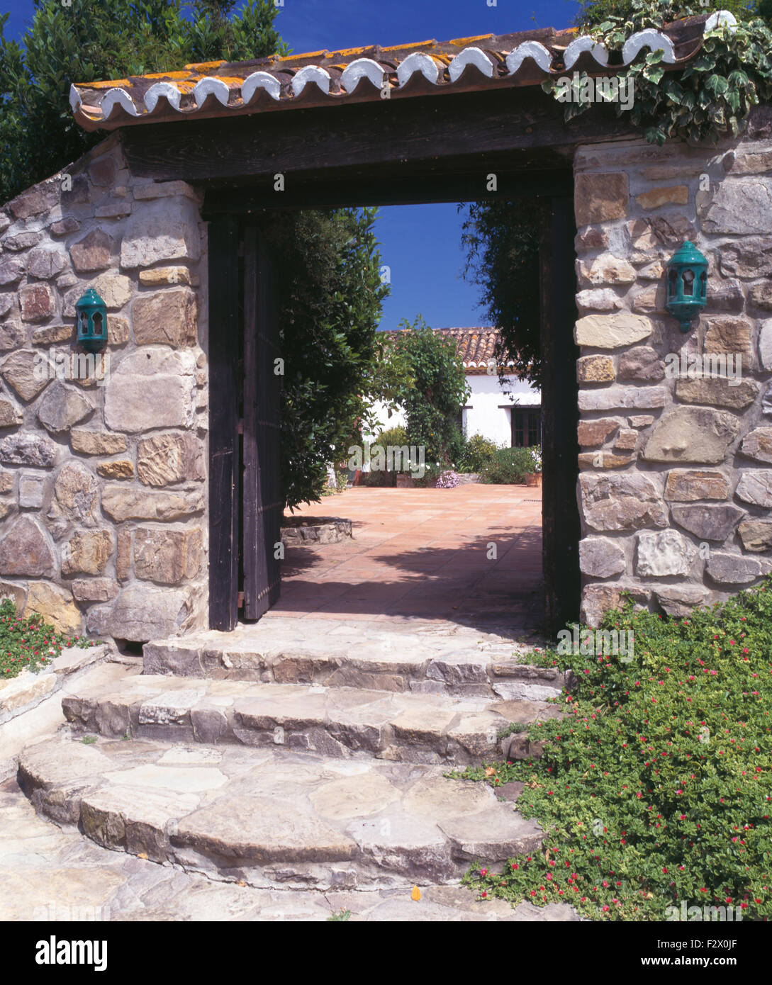 Stone steps to open gateway of traditional Spanish villa Stock Photo ...