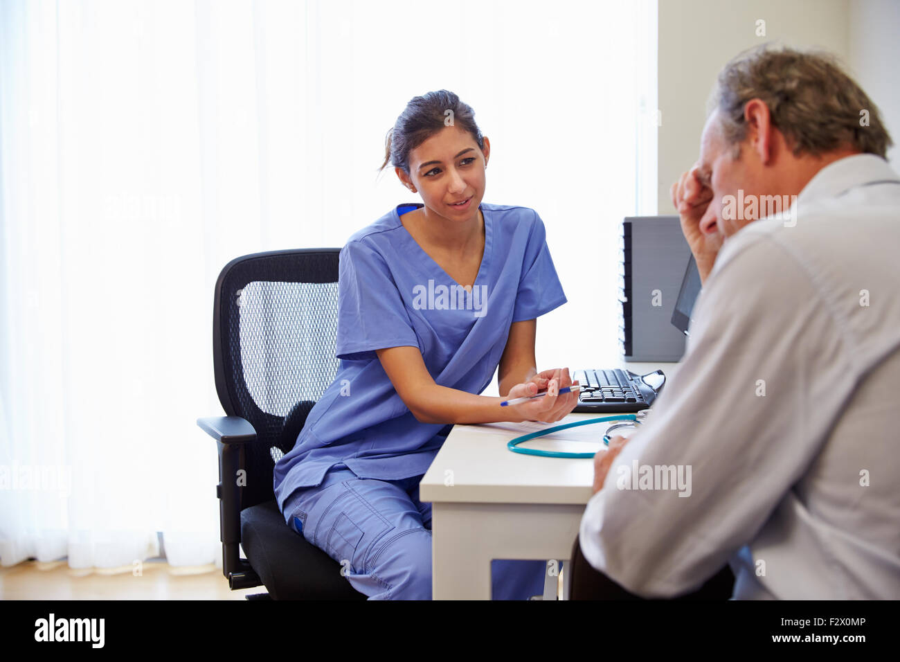 Female Doctor Treating Patient Suffering With Depression Stock Photo ...