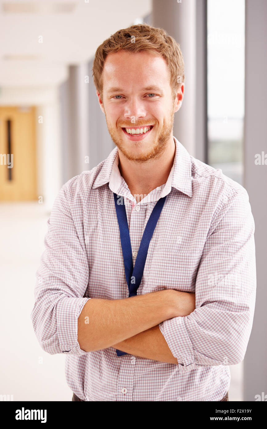 Portrait Of Male Doctor Standing In Hospital Corridor Stock Photo - Alamy
