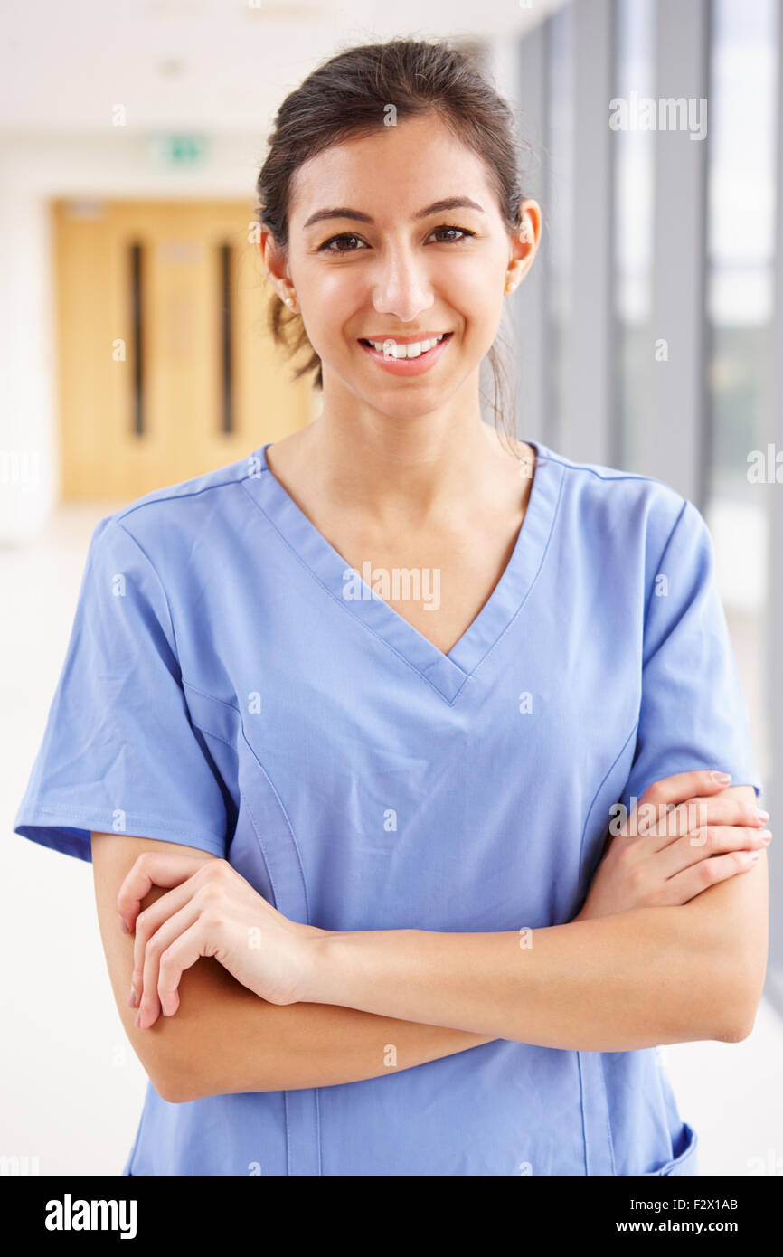 Portrait Of Female Nurse Standing In Hospital Corridor Stock Photo - Alamy