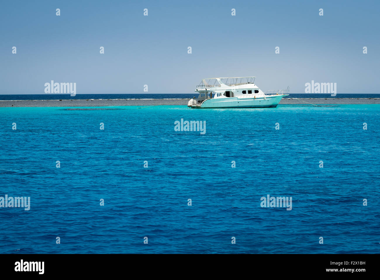 In the picture a yacht anchored near the port of Hamata , Egypt Red Sea ...