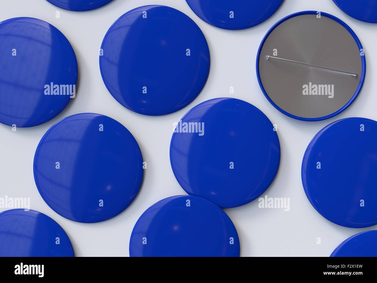 Blank blue pins on grey background Stock Photo - Alamy