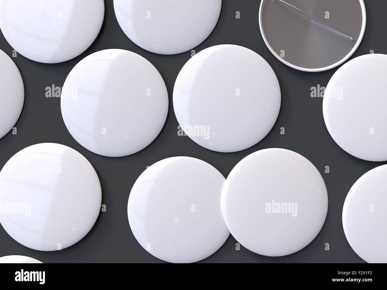 Blank white pins on grey background Stock Photo - Alamy