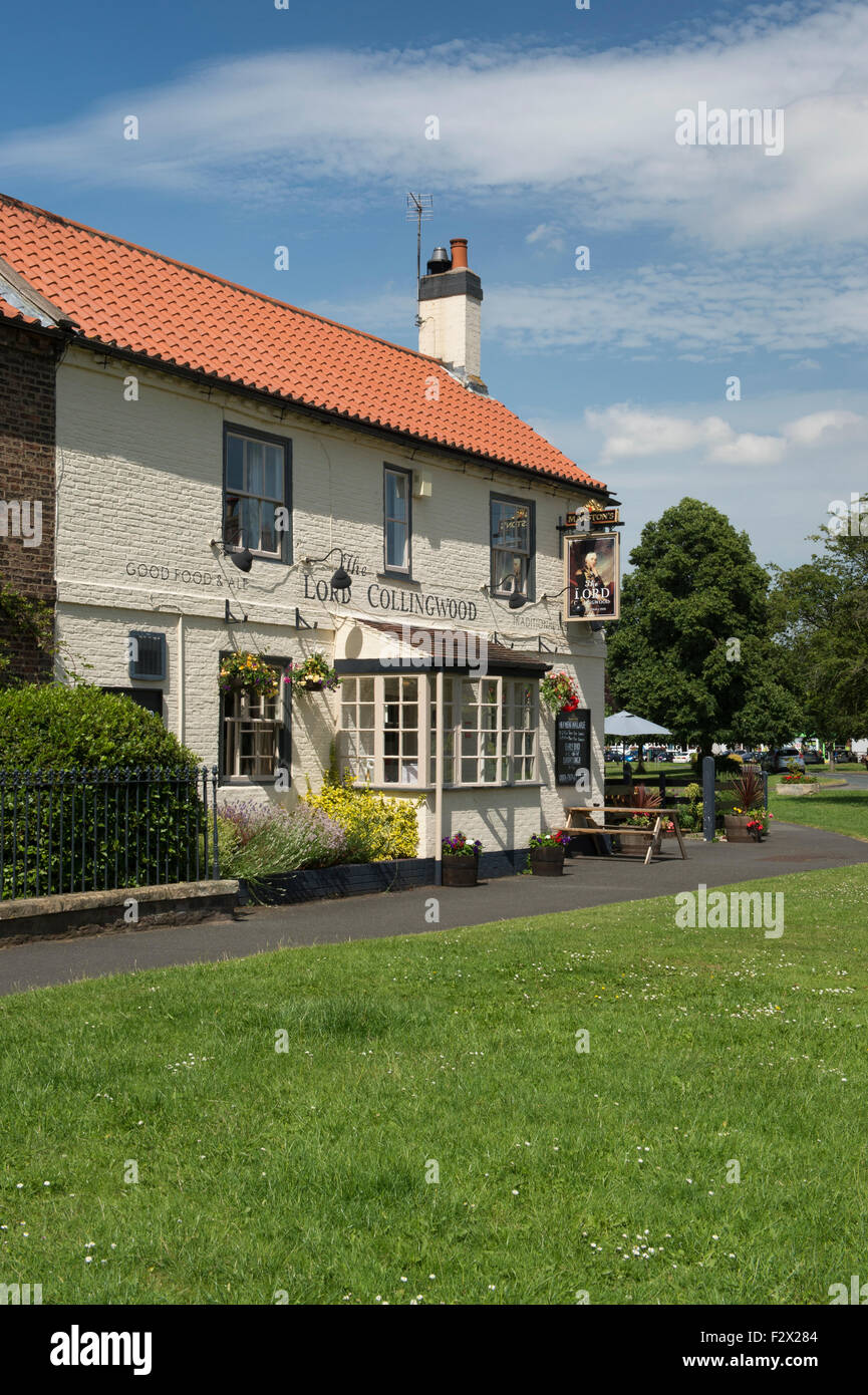 Sunny summer view of attractive, traditional, old, English rural pub ...