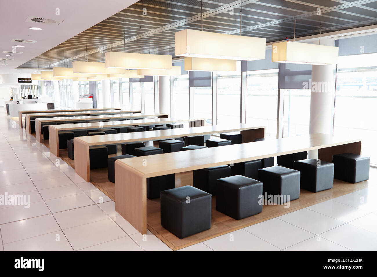 Seating in the empty cafeteria of a large business Stock Photo - Alamy