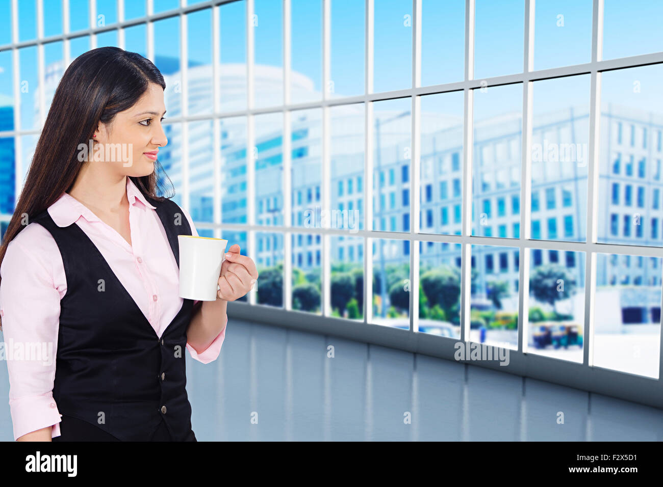1 indian Business Woman Drinking Tea Stock Photo - Alamy