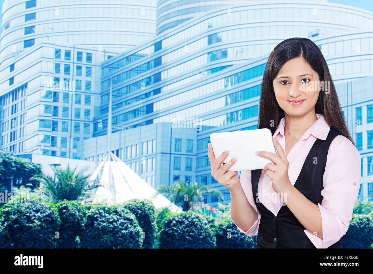 1 indian Business Woman Dialing Digital Tablet Stock Photo - Alamy