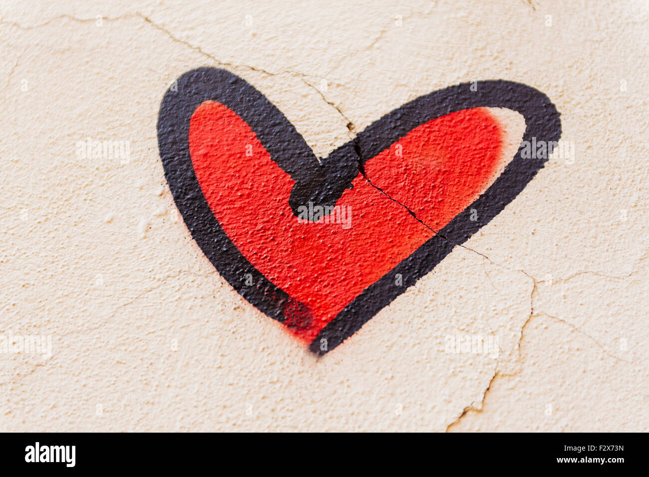 Red heart with plaster hi-res stock photography and images - Alamy