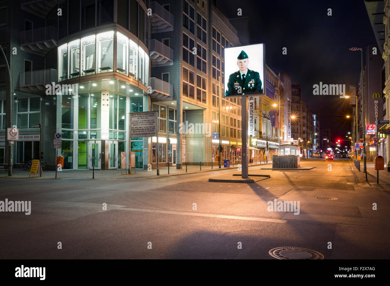Germany, Berlin, Berlin-Mitte, Checkpoint Charlie at night Stock Photo ...