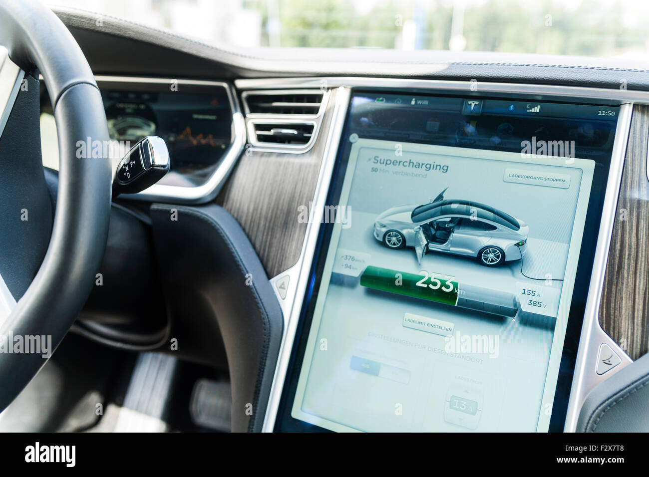 Dashboard with computer of an electric car Stock Photo - Alamy