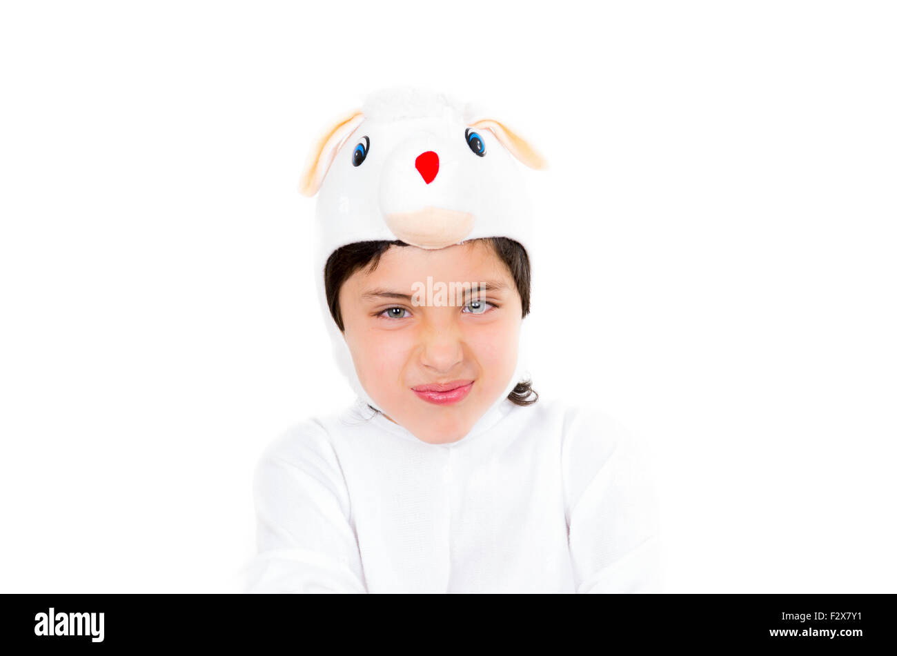 Cute young boy dressed in bunny costume making adorable faces isolated ...