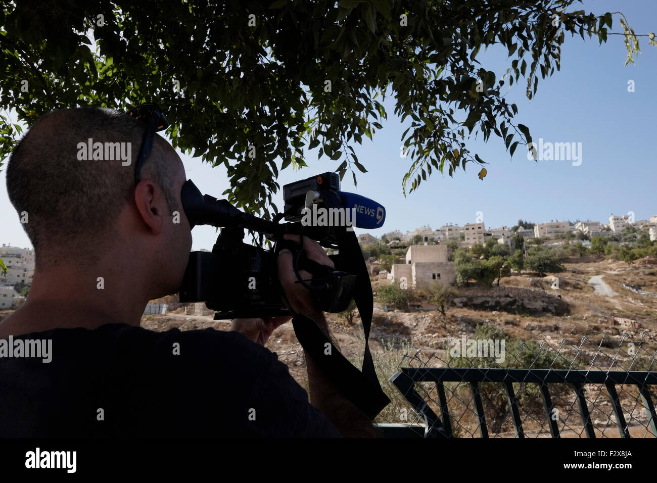 ISRAEL - JERUSALEM 24 SEPTEMBER: A journalist from channel 9 a local ...