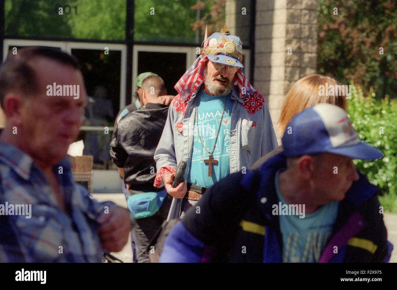 homeless man wearing cross San Jose homeless, low income residents, and ...
