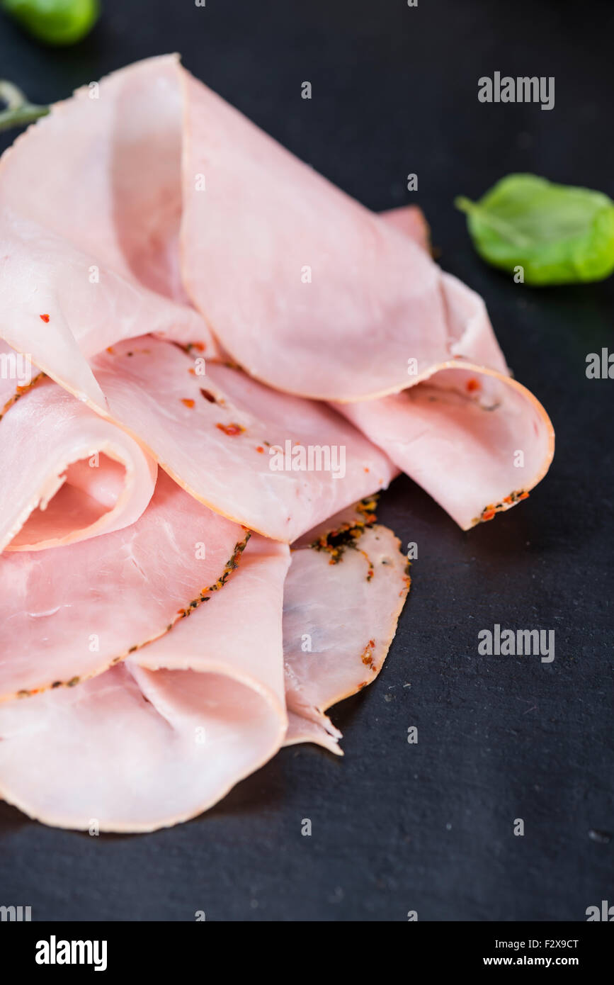 Ham with fresh herbs (close-up shot) on dark rustic background Stock ...