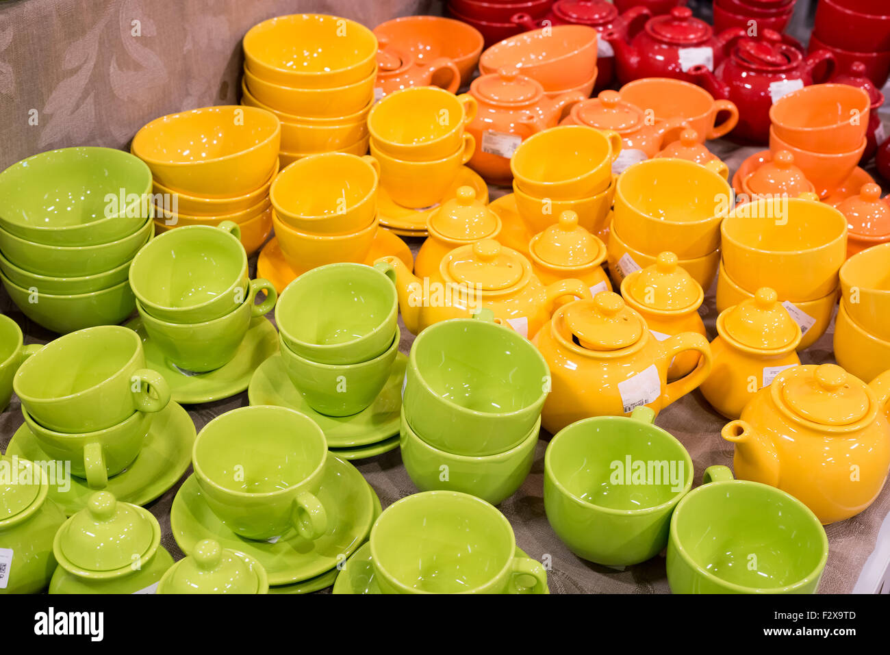 Many tea cups and saucers are on table Stock Photo - Alamy