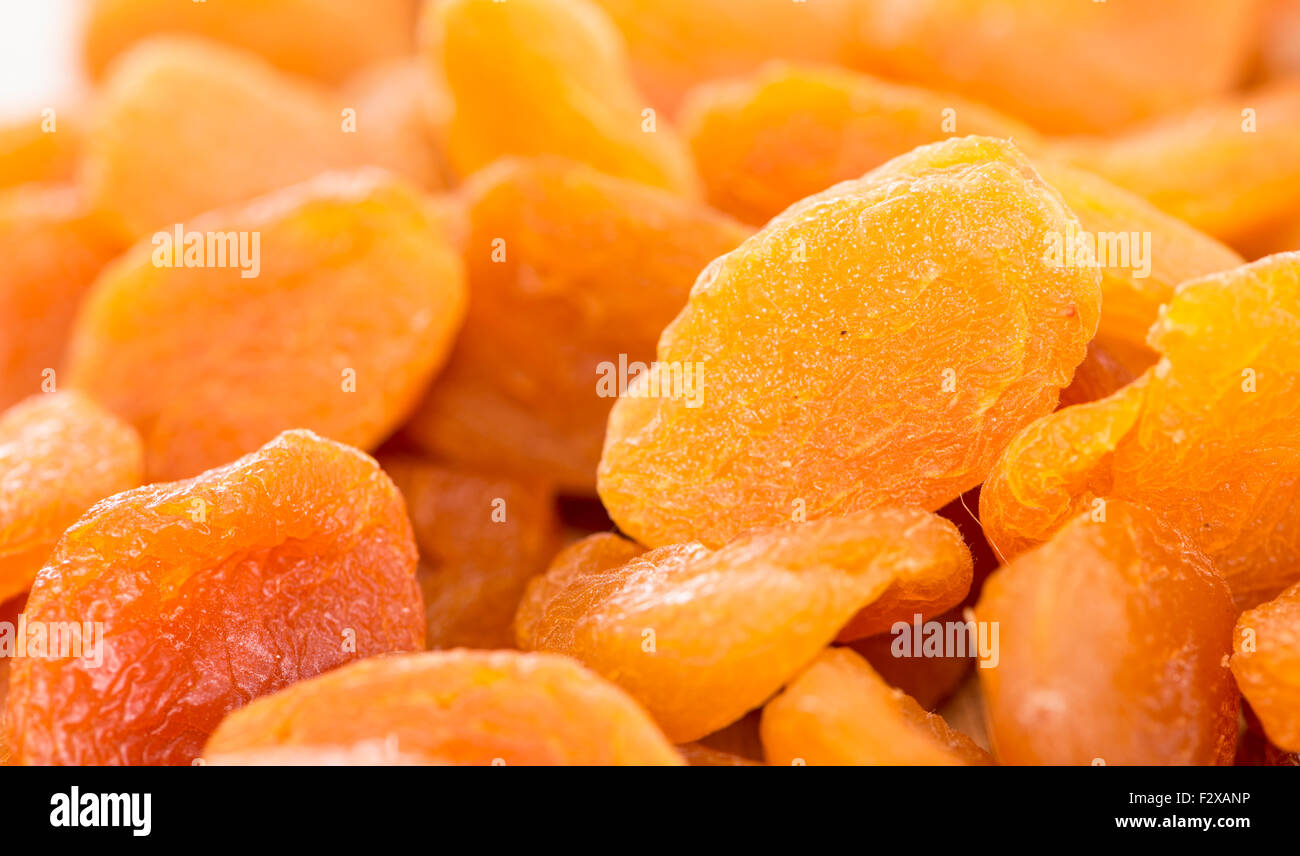 Portion of Dried Apricots for background or texture use Stock Photo - Alamy