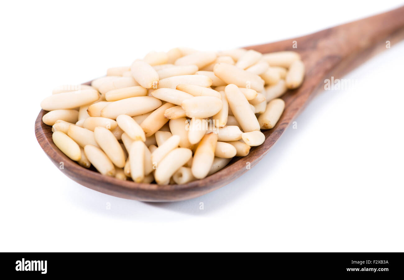 Heap of fresh Pine Nuts isolated on pure white background Stock Photo ...