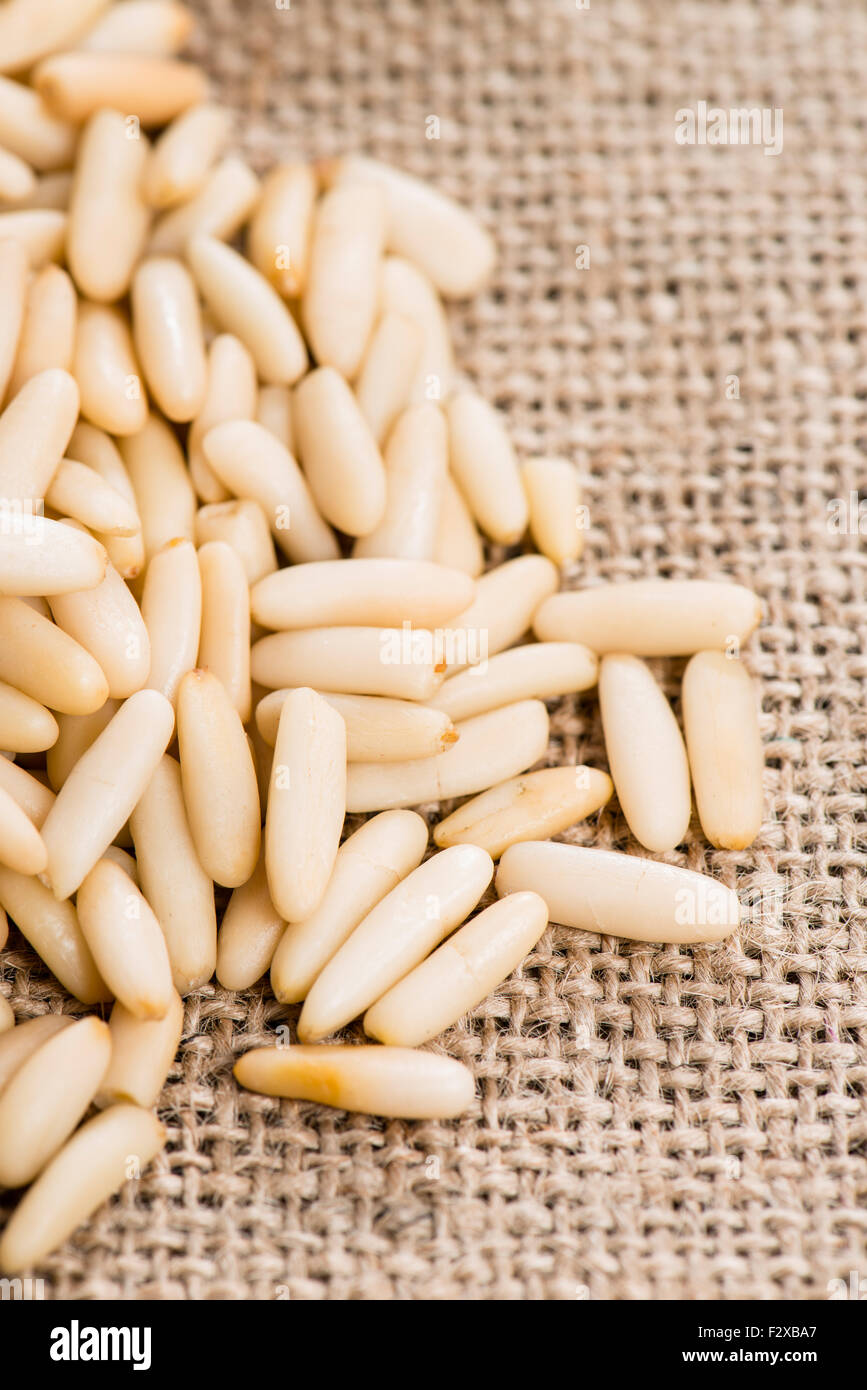 Small portion of Pine Nuts as detailed close-up shot Stock Photo - Alamy