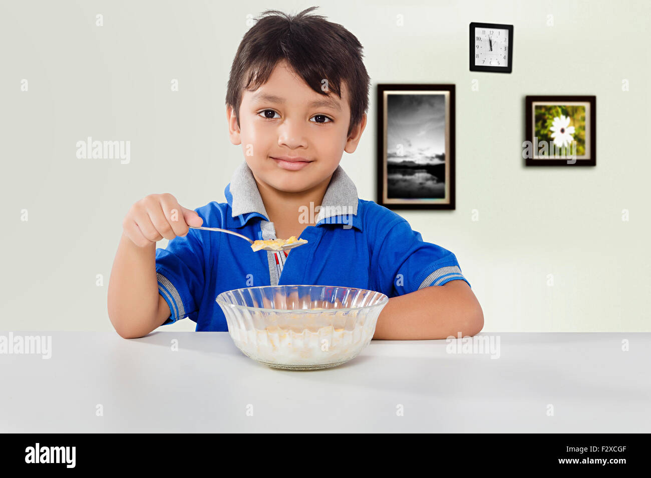 1 indian Kid boy Breakfast Eating Corn Flakes Stock Photo - Alamy