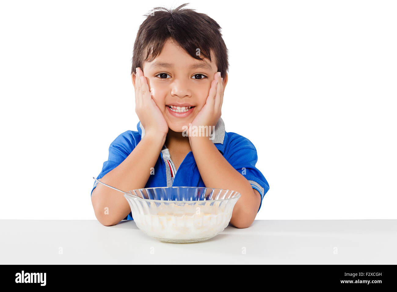 1 indian Kid boy Breakfast Eating Corn Flakes Stock Photo - Alamy