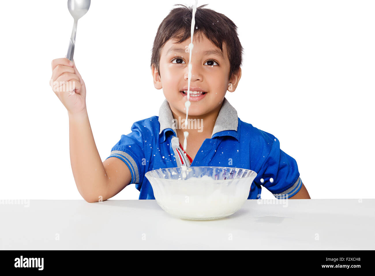 1 indian Kid boy Breakfast Drinking milk Breakfast Stock Photo - Alamy