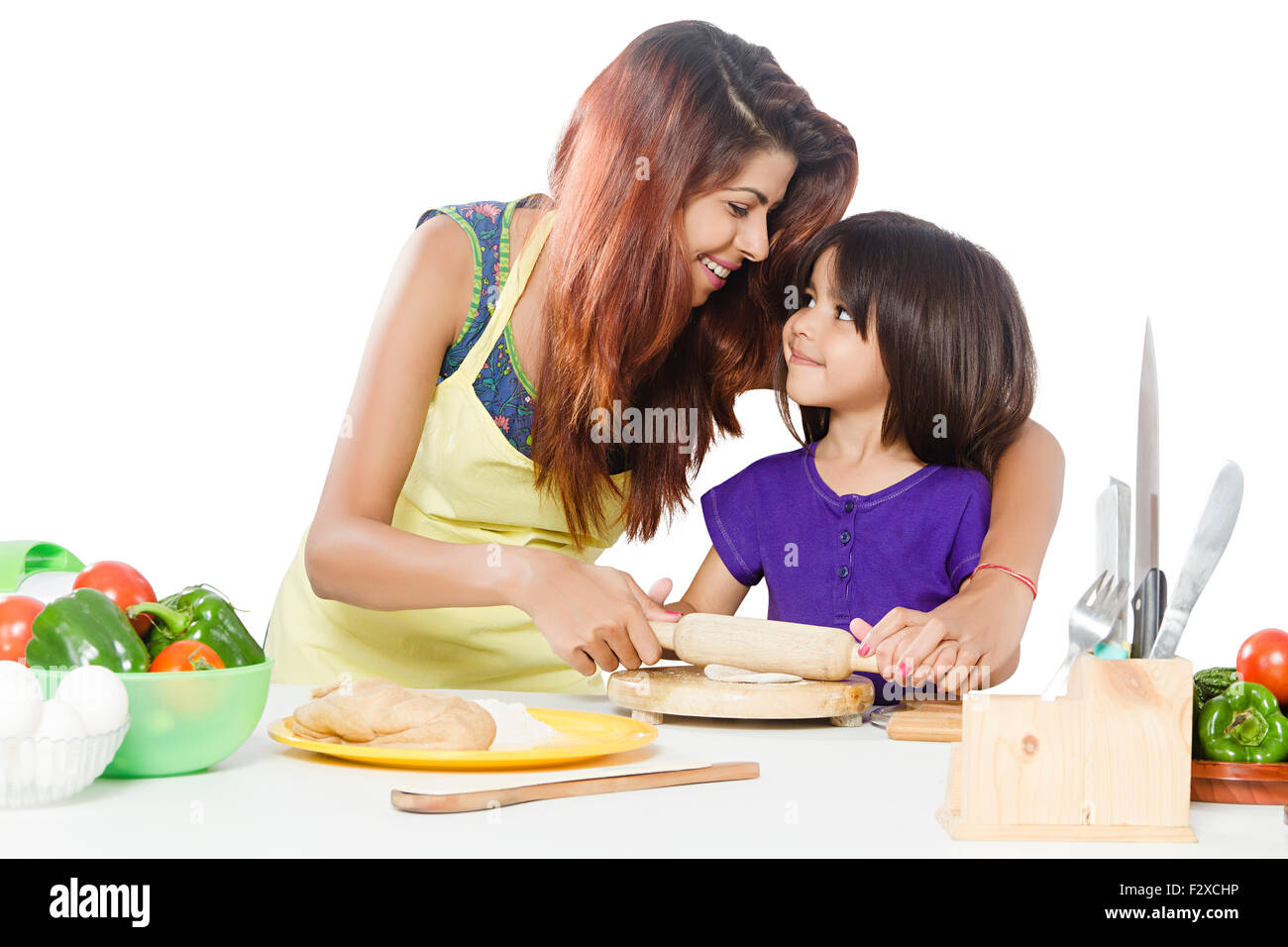 2 indian Mother and kid daughter Kitchen Cooking Stock Photo - Alamy
