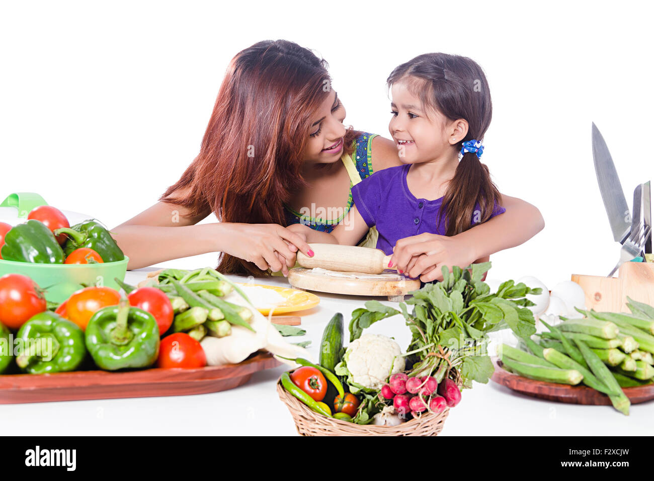 2 indian Mother and kid daughter Kitchen Cooking Stock Photo - Alamy
