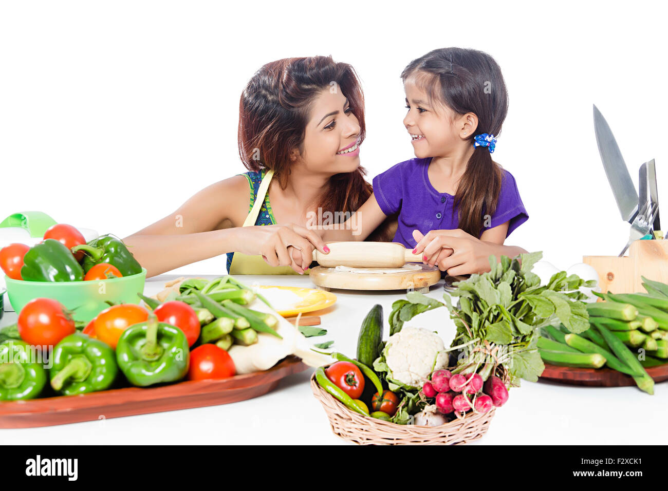 2 indian Mother and kid daughter Kitchen Cooking Stock Photo - Alamy