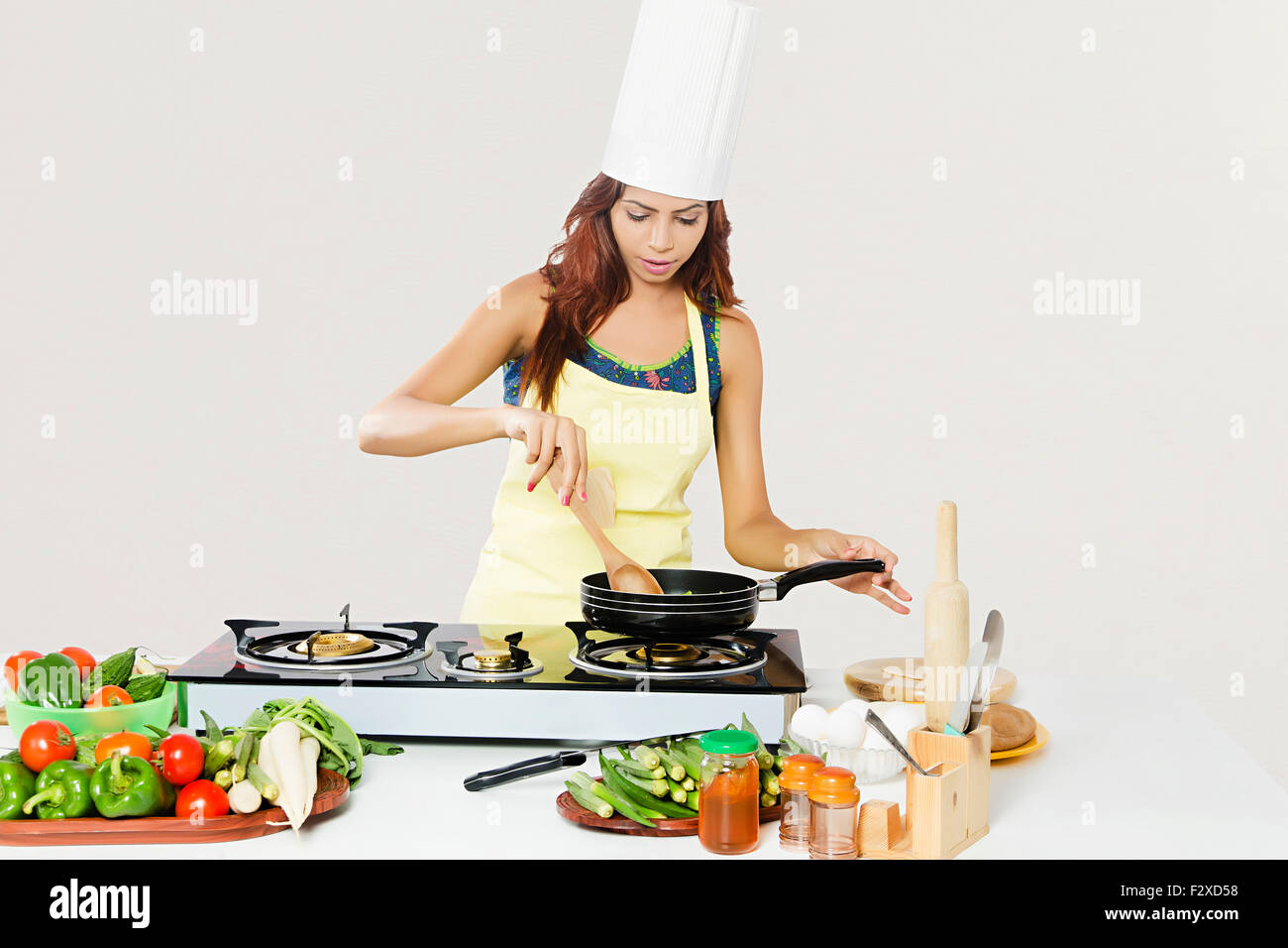 Multitasking Woman Cooking High Resolution Stock Photography and Images ...
