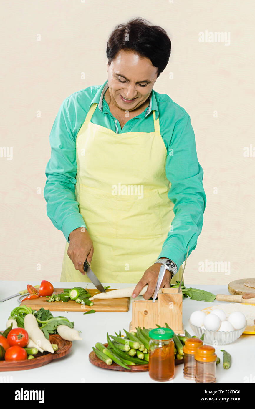 Indian man cooking, white background hi-res stock photography and ...