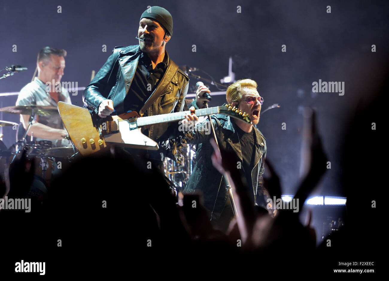 U2 bassist adam clayton live on stage hi-res stock photography and ...
