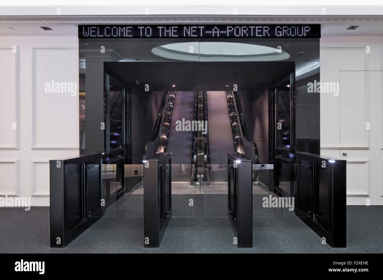 Escalator from entrance vestibule to main reception. Net-a-Porter ...