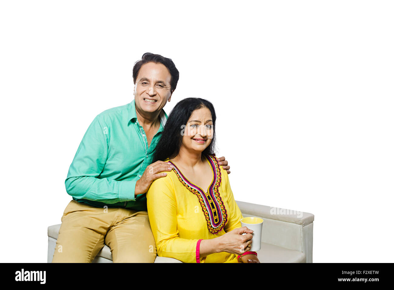 2 indian adult Married Couple sitting home laptop working Stock Photo ...