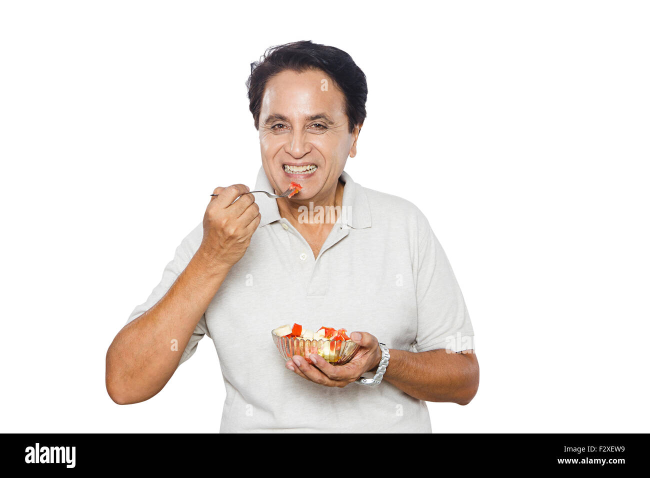 Indian man eating indoor hi-res stock photography and images - Alamy
