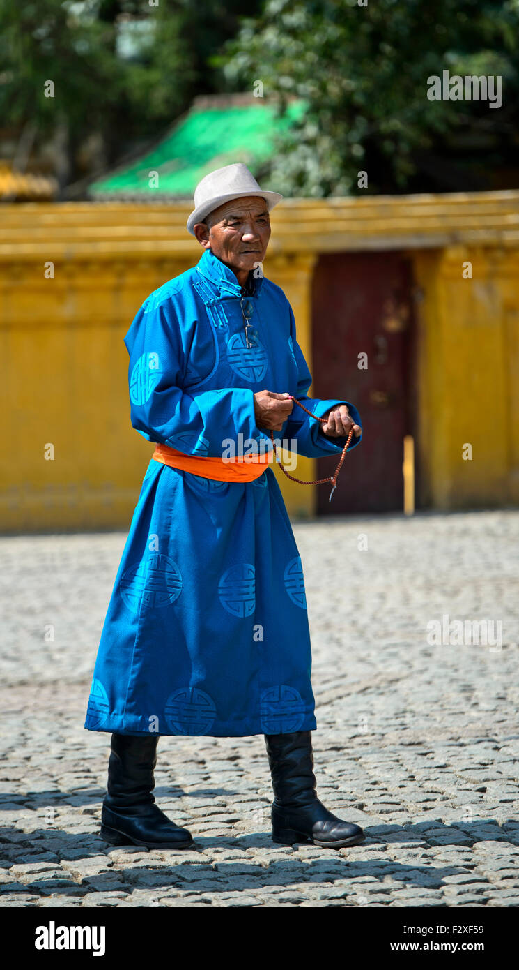 Mongolian man in traditional clothing, Deel, Gandan Monastery ...