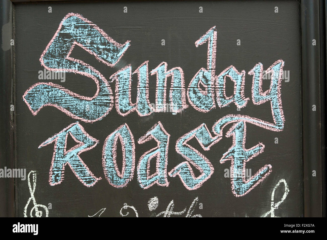 Sunday roast sign outside pub, High Street, Brentford, London Borough ...