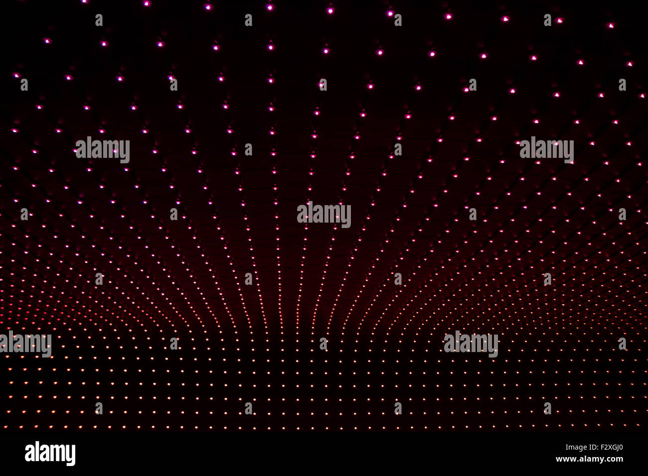 dark background with multicolored LEDs in perspective Stock Photo - Alamy