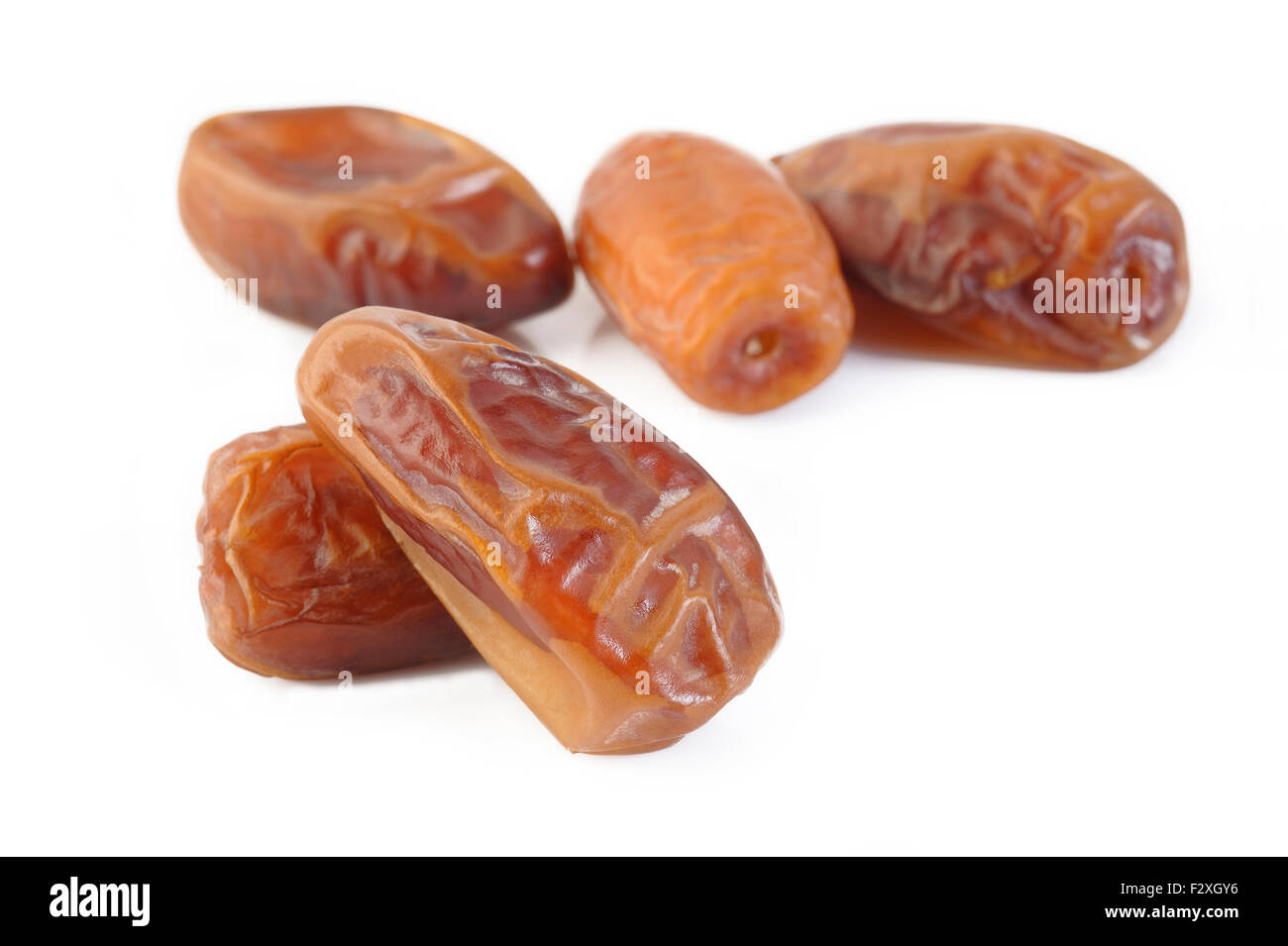 Sweet dried dates fruit on Cut Out Stock Images & Pictures - Alamy