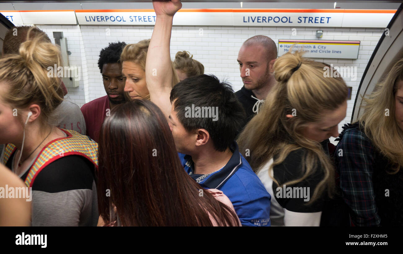crowded packed London underground tube train on the Central line ...