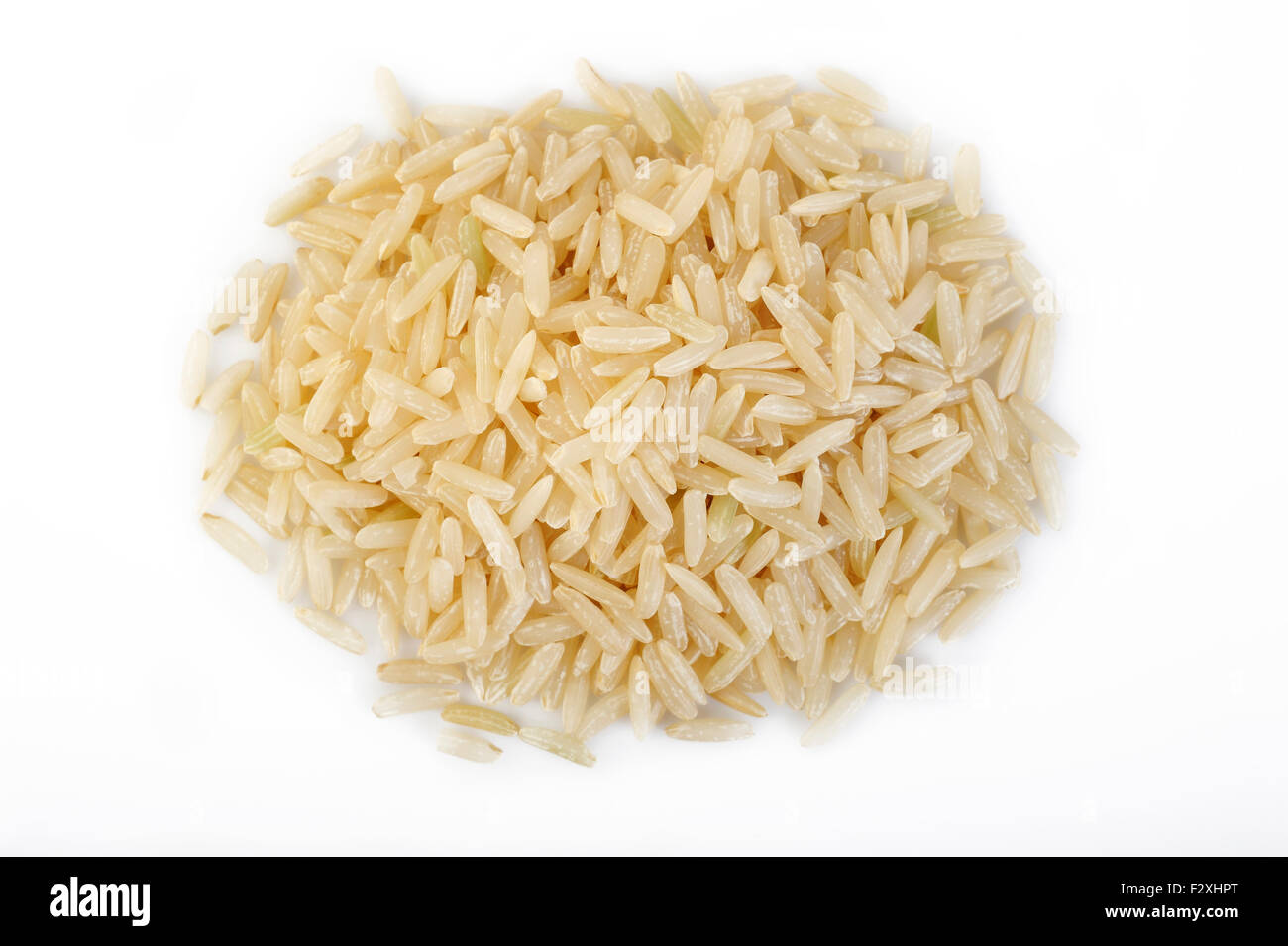 Brown rice on white background Stock Photo - Alamy
