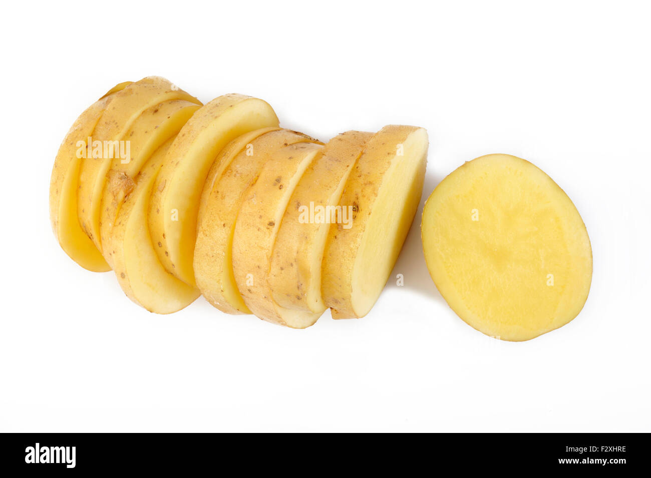Fresh sliced potatoes on white background Stock Photo - Alamy