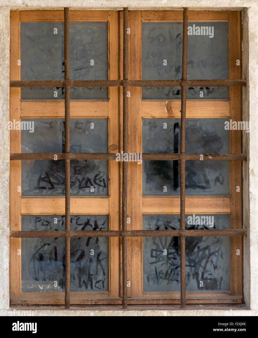 an old window with the metal bars Stock Photo - Alamy