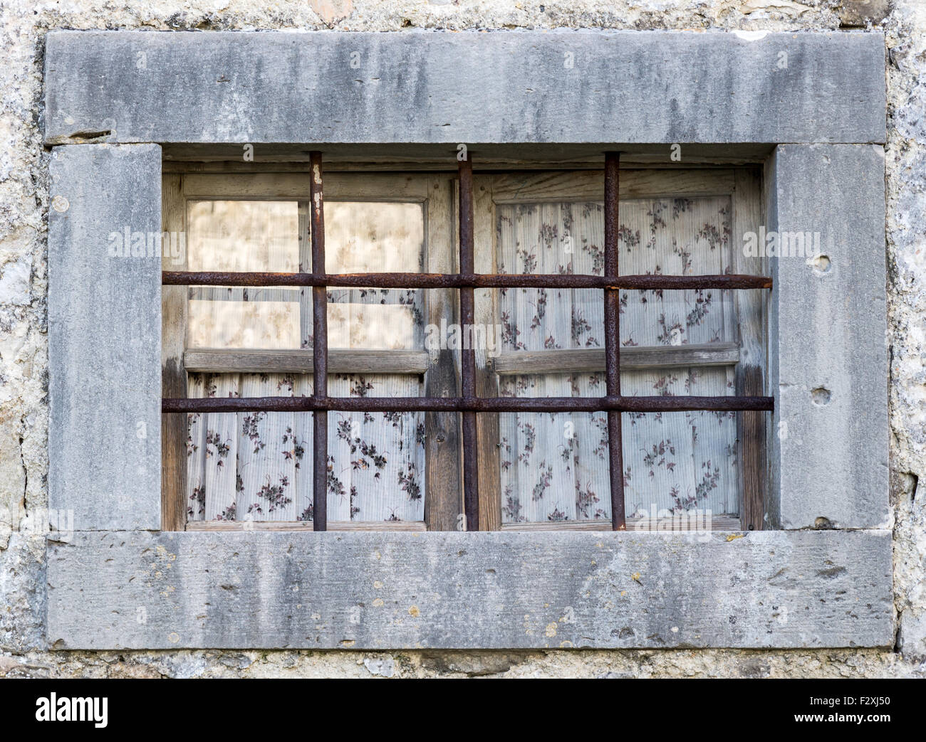 an old window with the metal bars Stock Photo - Alamy