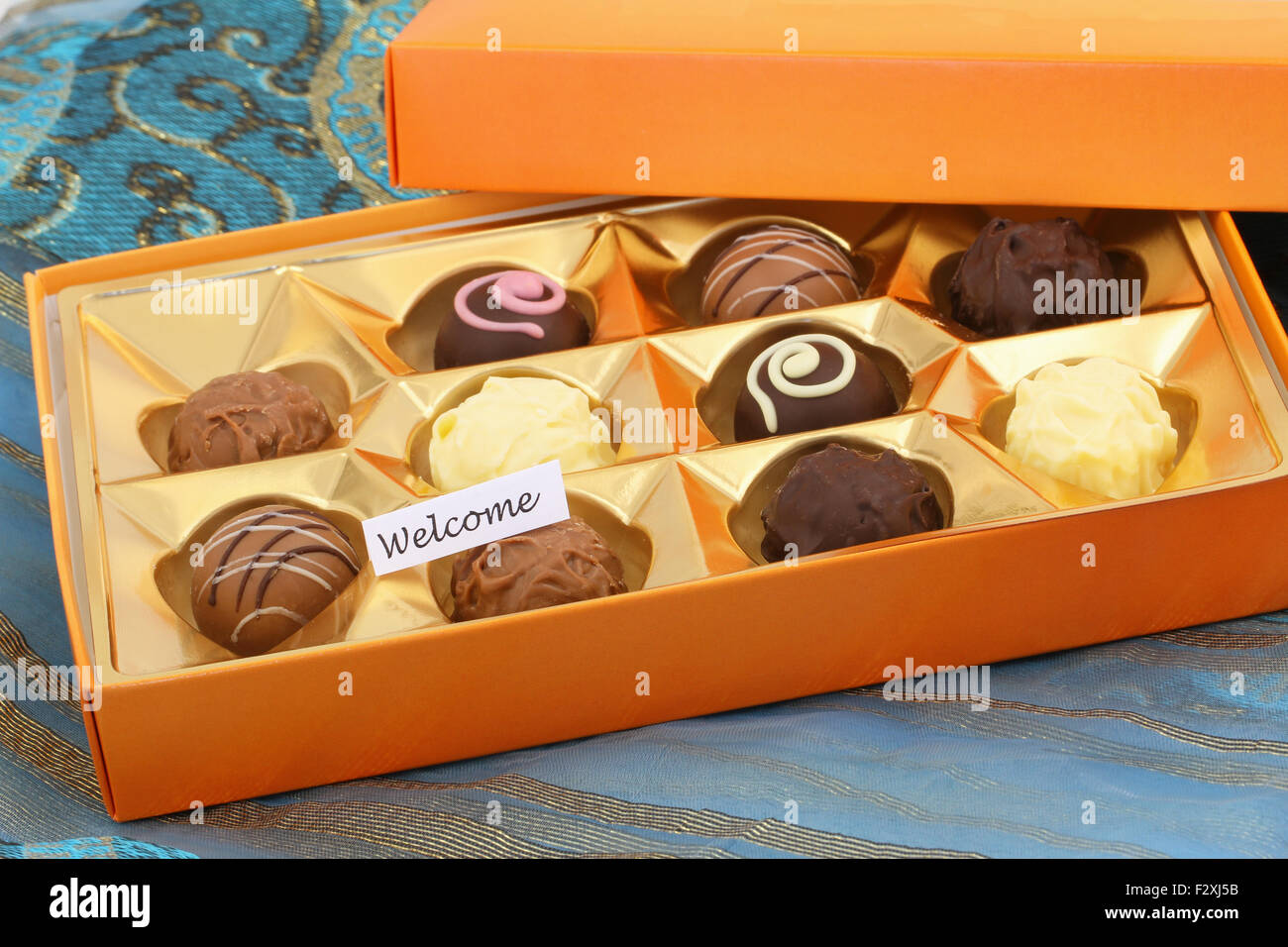 Welcome card with box of assorted chocolates Stock Photo - Alamy
