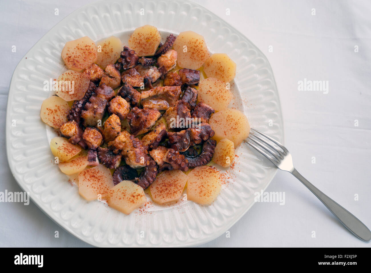 octopus galician style, spanish tapas dish Stock Photo - Alamy